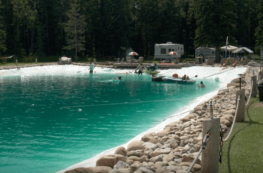 This Guy Built His Family an Epic Backyard Swimming Pond
