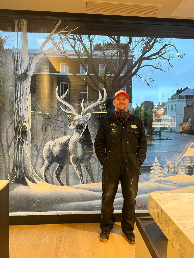 How to Decorate Windows With Snow Spray, According to a Pro
