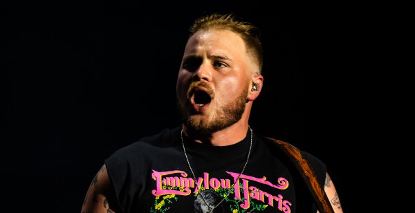 Zach Bryan Suffered Embarrassing Wardrobe Malfunction When Jumping ...