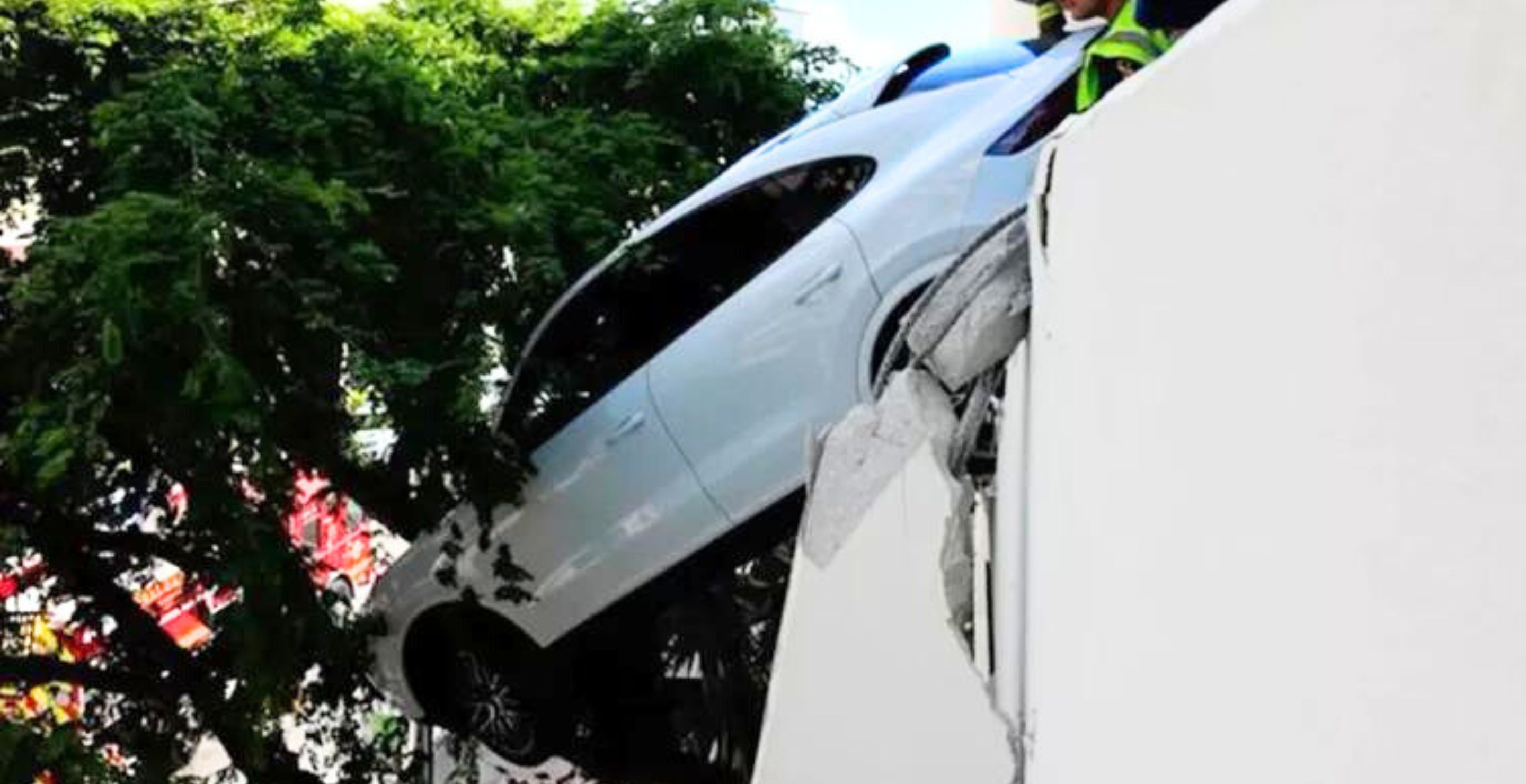 Woman Crashes Porsche Through Parking Garage On Third Floor And Onto ...