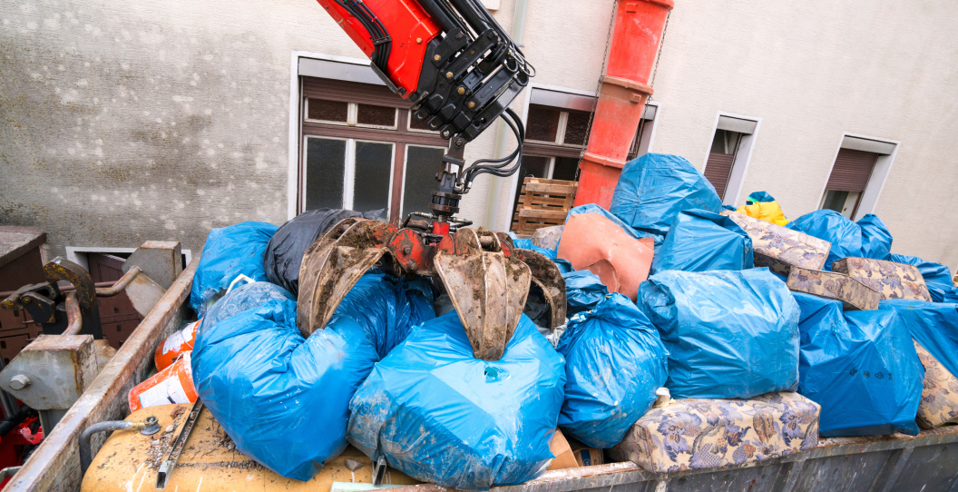 Family Sues After Woman Dies from Being Crushed by Garbage Truck Claw