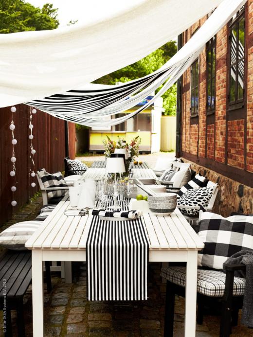 15 Gorgeous Backyard Dining Tables Made for Summer Entertaining
